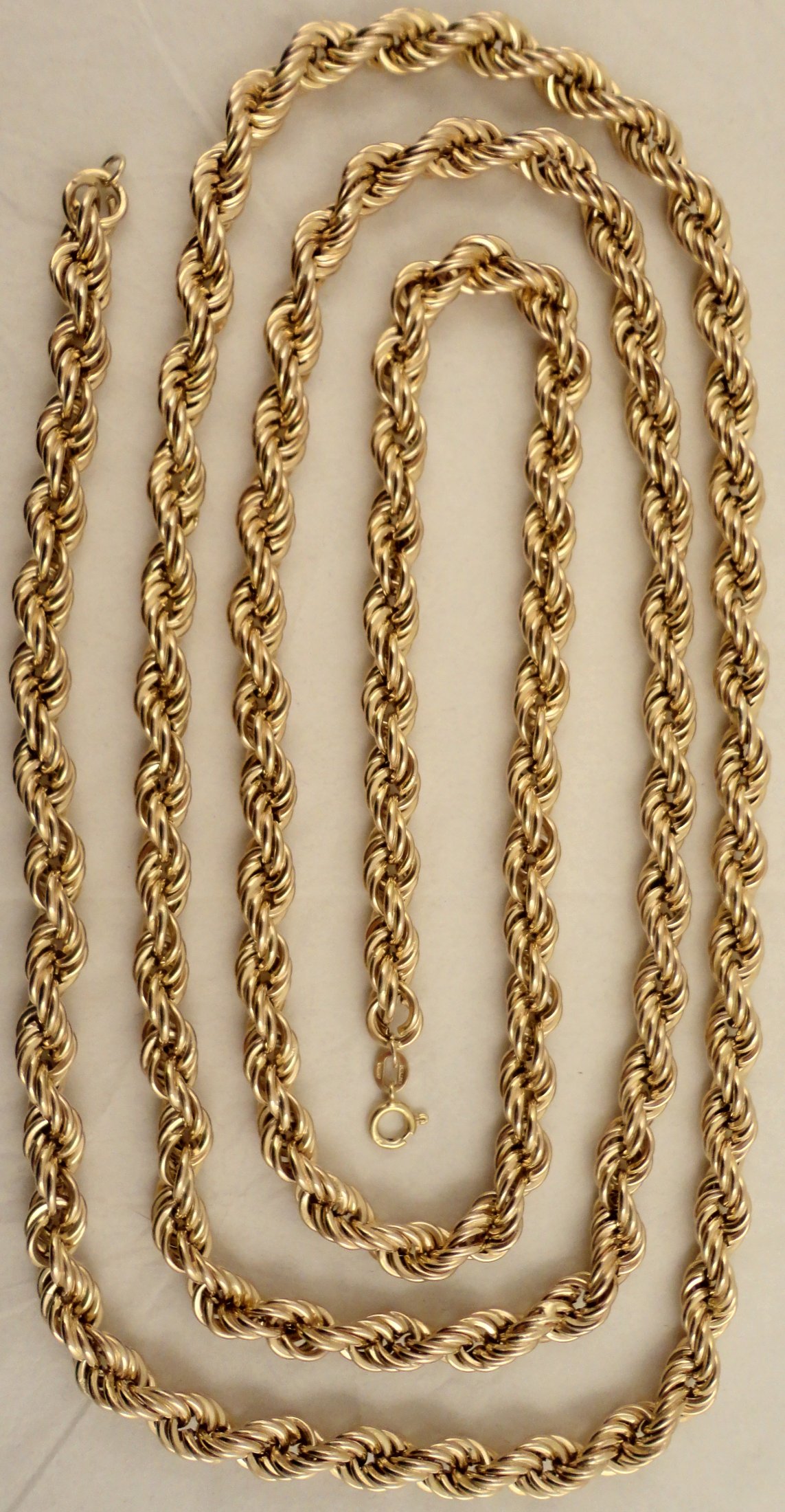 A massive and heavy 9ct gold 54 inch rope chain necklace Weighs 95 ...