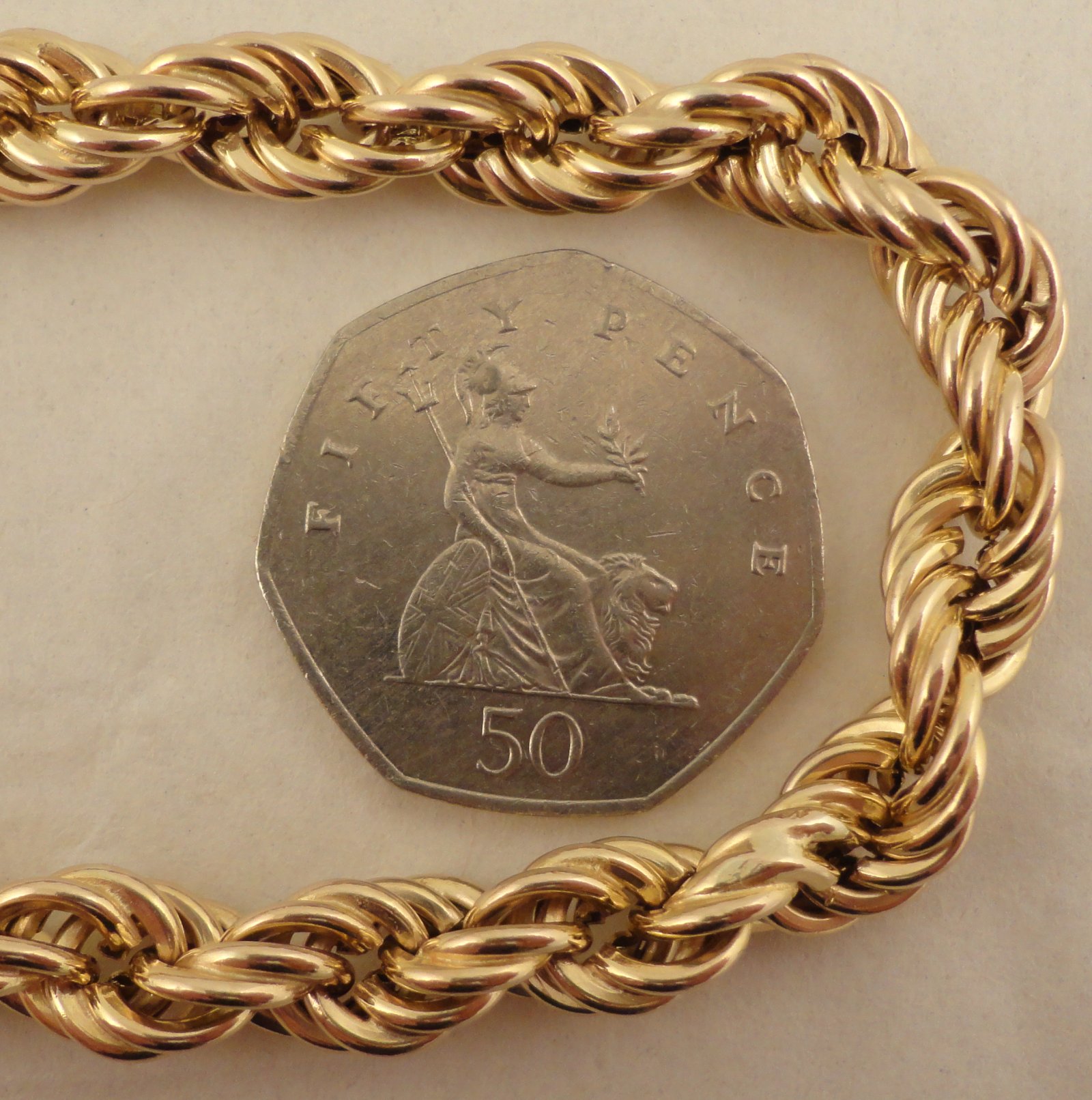 A massive and heavy 9ct gold 54 inch rope chain necklace Weighs 95 ...